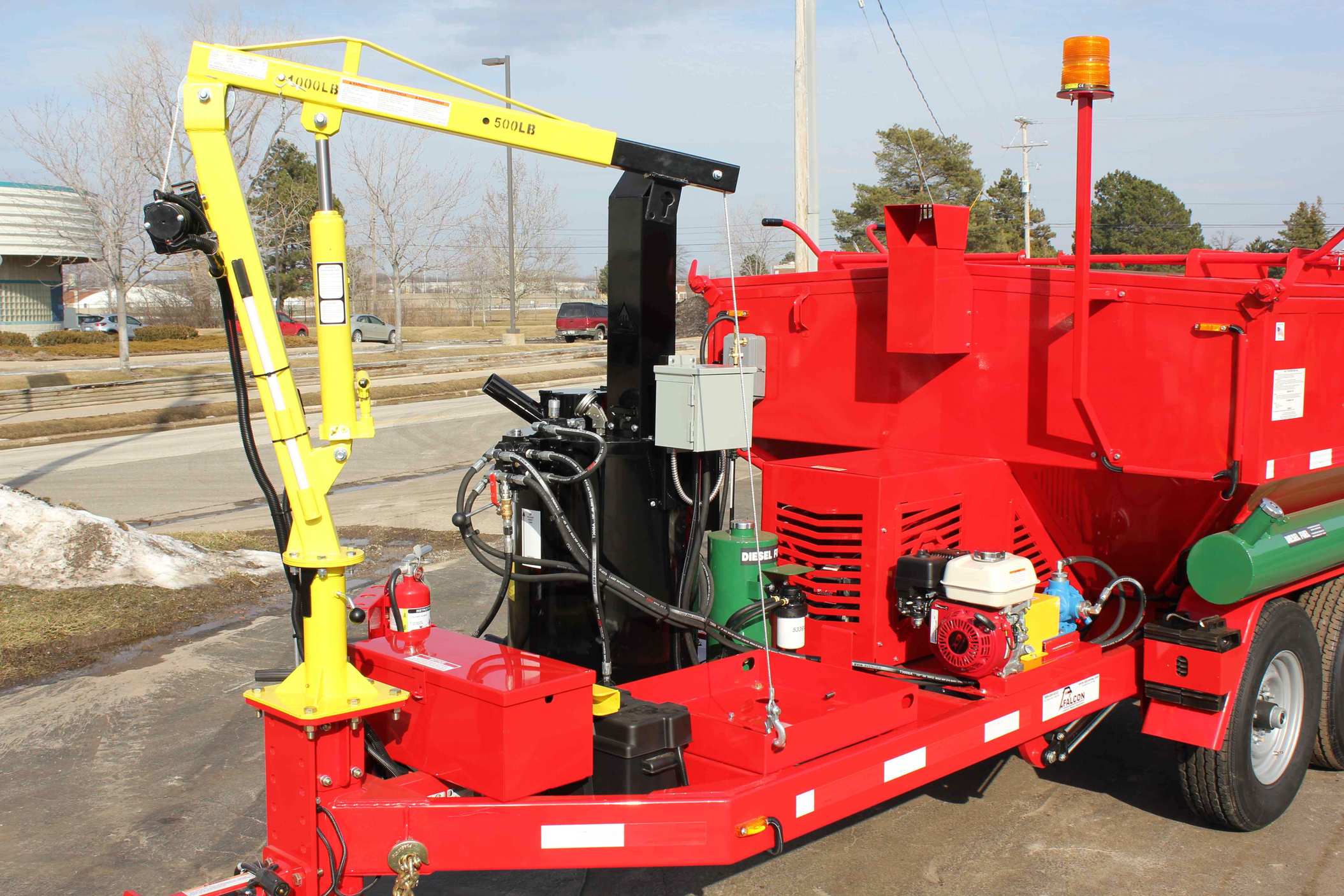 Hoist with 12-volt winch on Falcon hot mix heater trailer | Falcon ...